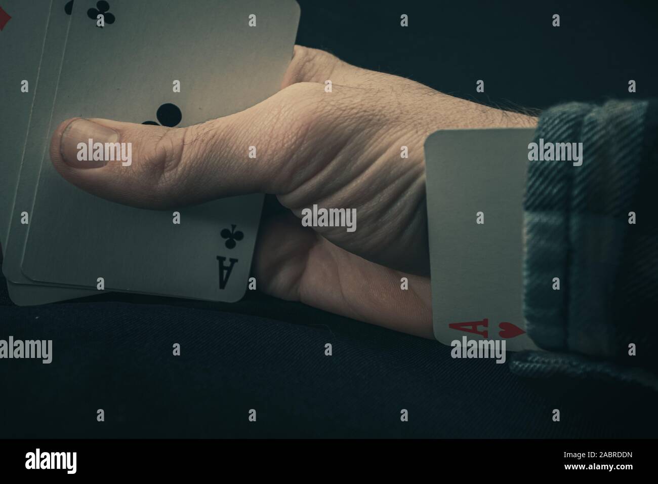 Playing cards ace hand sleeve hi-res stock photography and images - Alamy