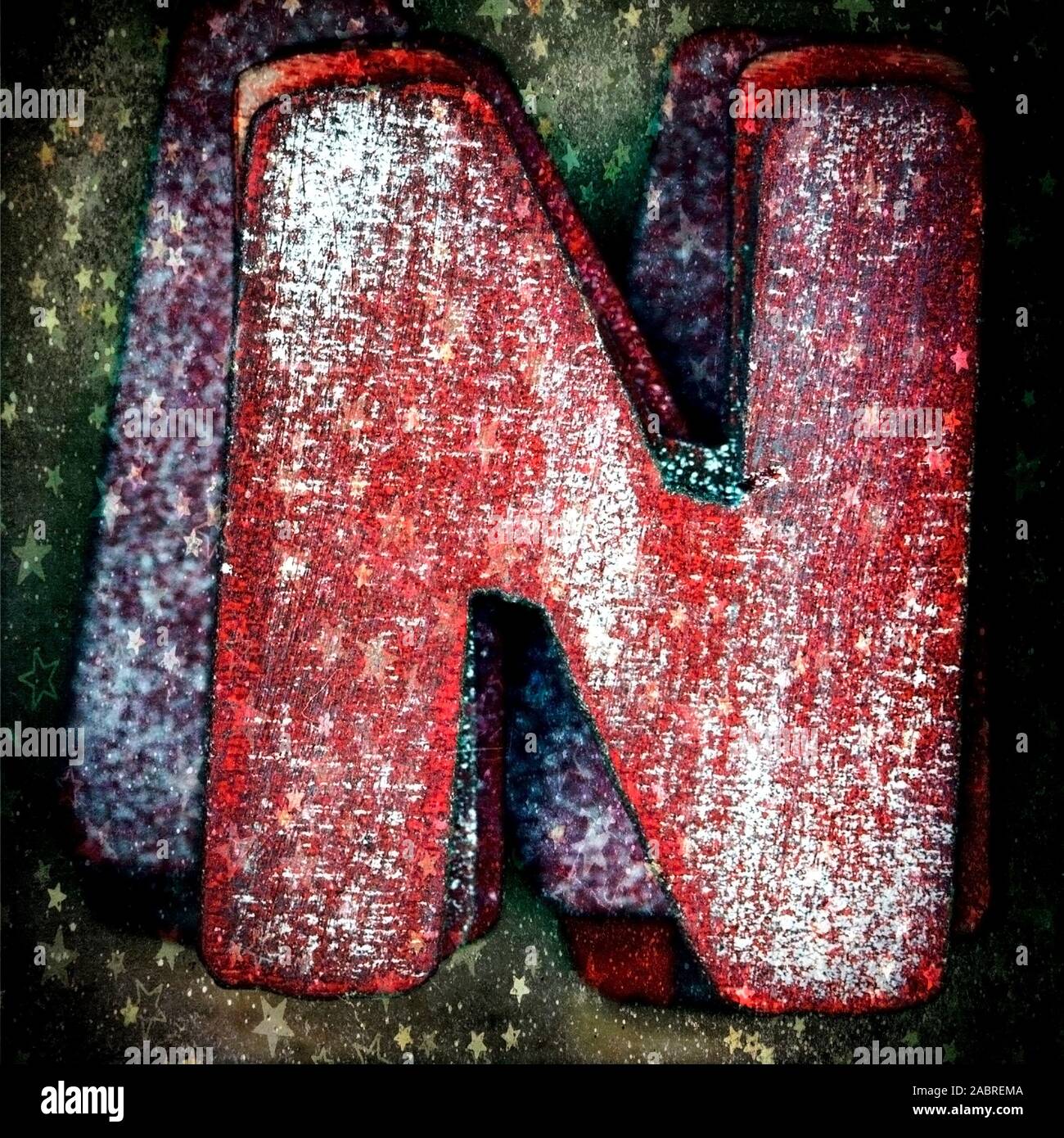 old wooden letter A in a box shot from above macro image with Christmas ...