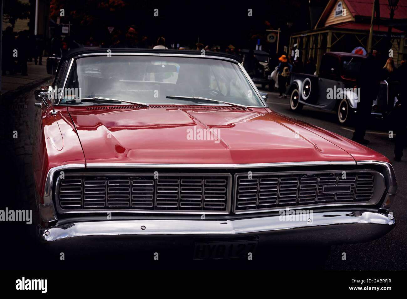 A Retro Red Sedan Car On Show In The Street Stock Photo - Alamy