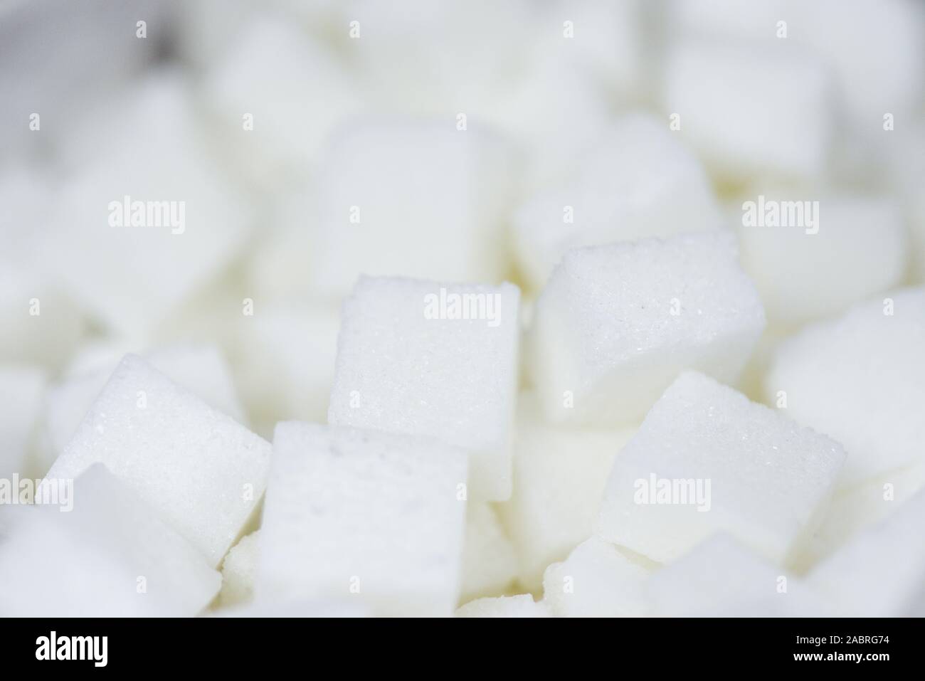 Close up of white sugar , top view / Sugar cubes texture background ...