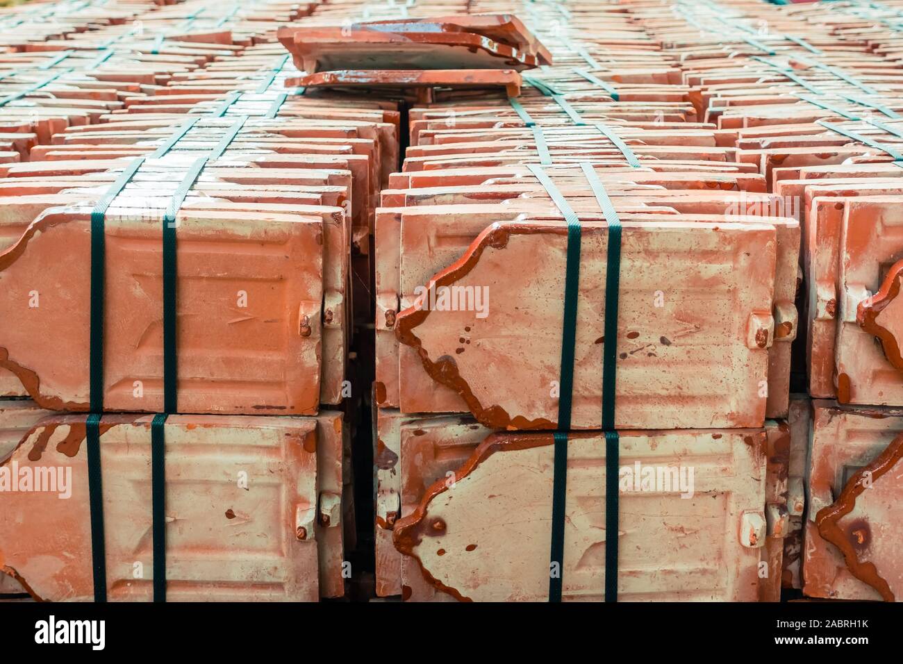 Close up to many pile of roof tiles traditional clay stack for a ...