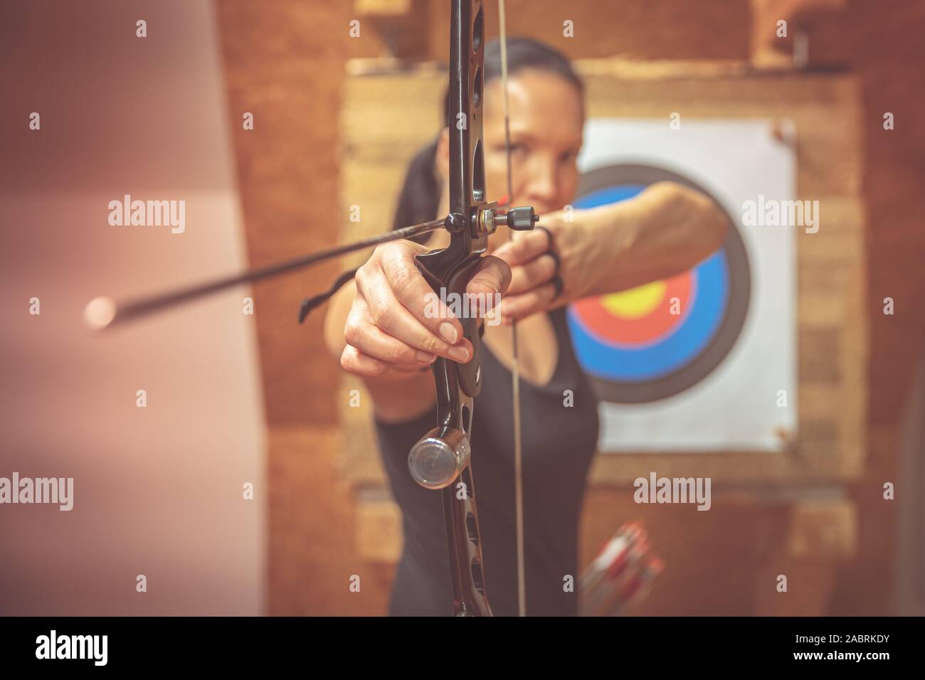Beautiful woman aiming bow arrow hi-res stock photography and images ...