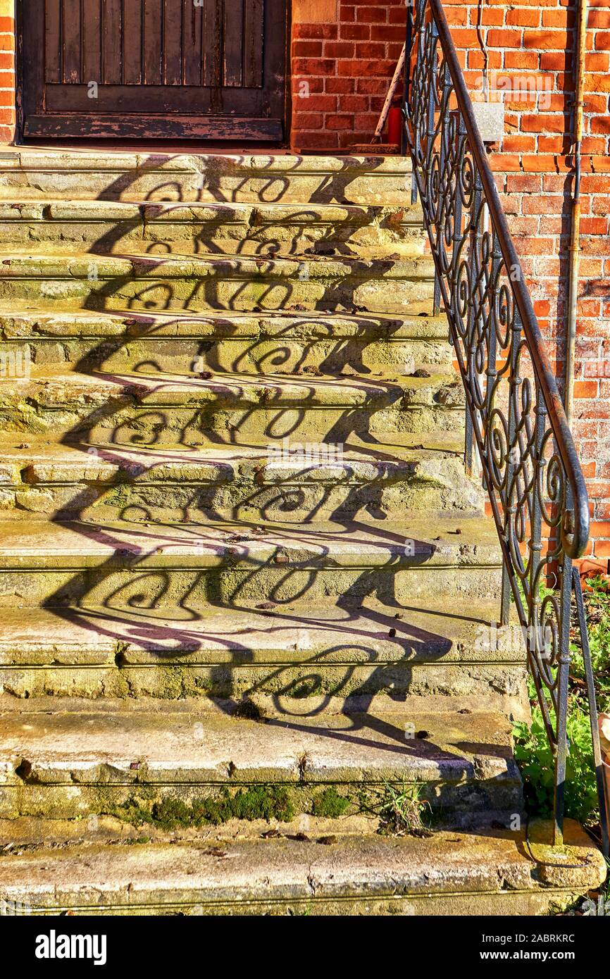 Wrought iron railing on stairs hi-res stock photography and images - Alamy