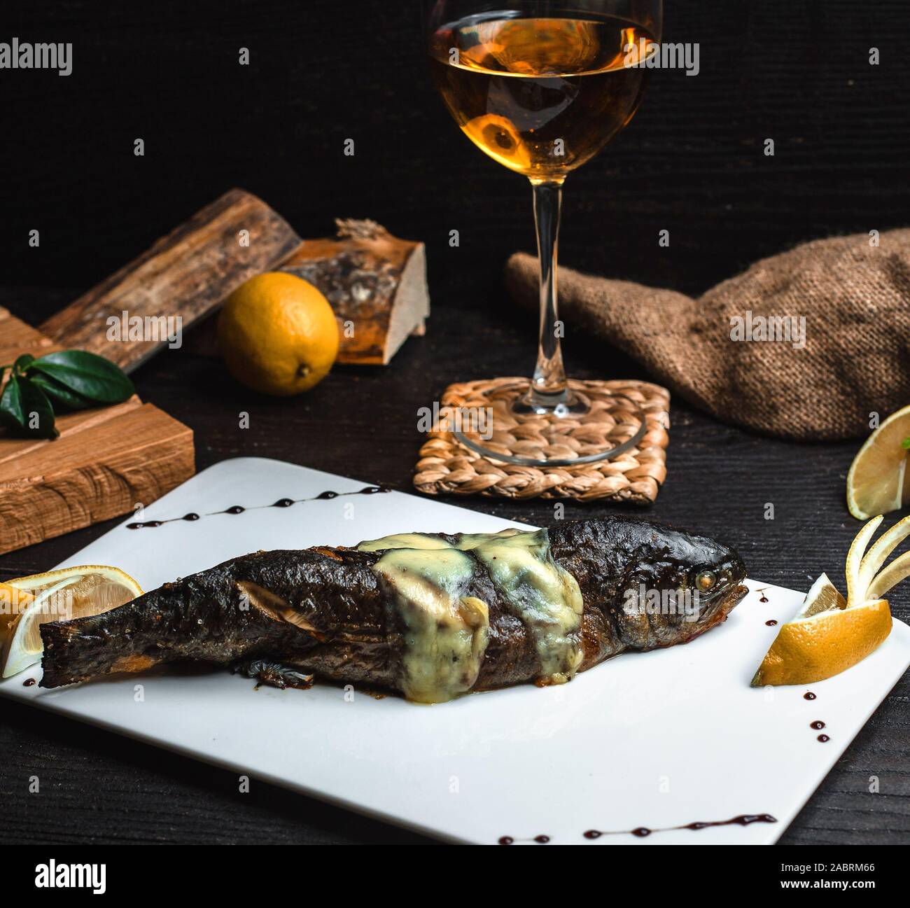 grilled fish wrapped in cream cheese Stock Photo - Alamy