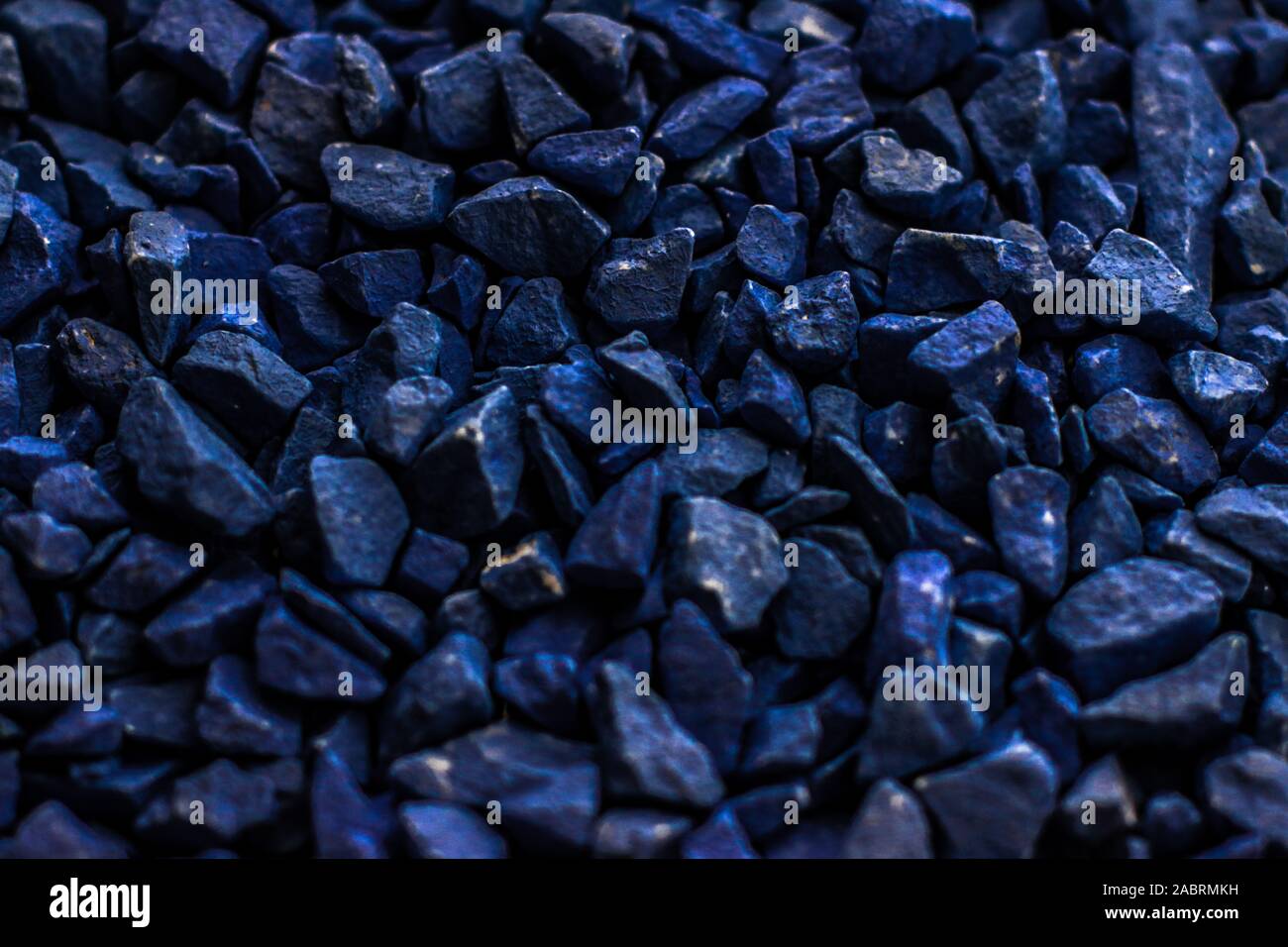 Decor, surface and nature concept - Dark blue stone pebbles as abstract ...