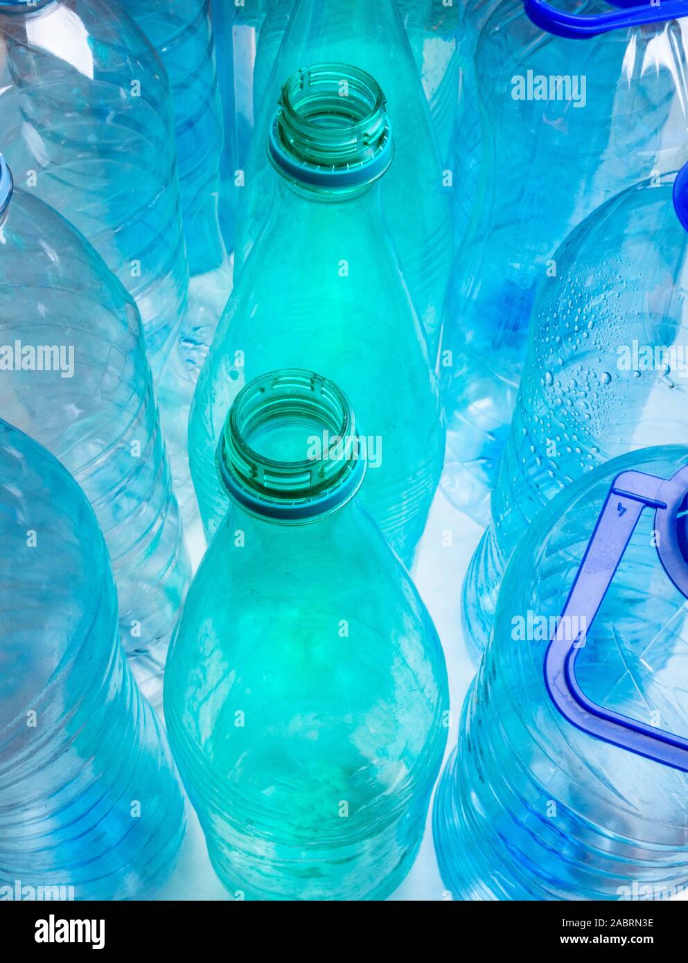Rows of water bottles background, close up Stock Photo - Alamy