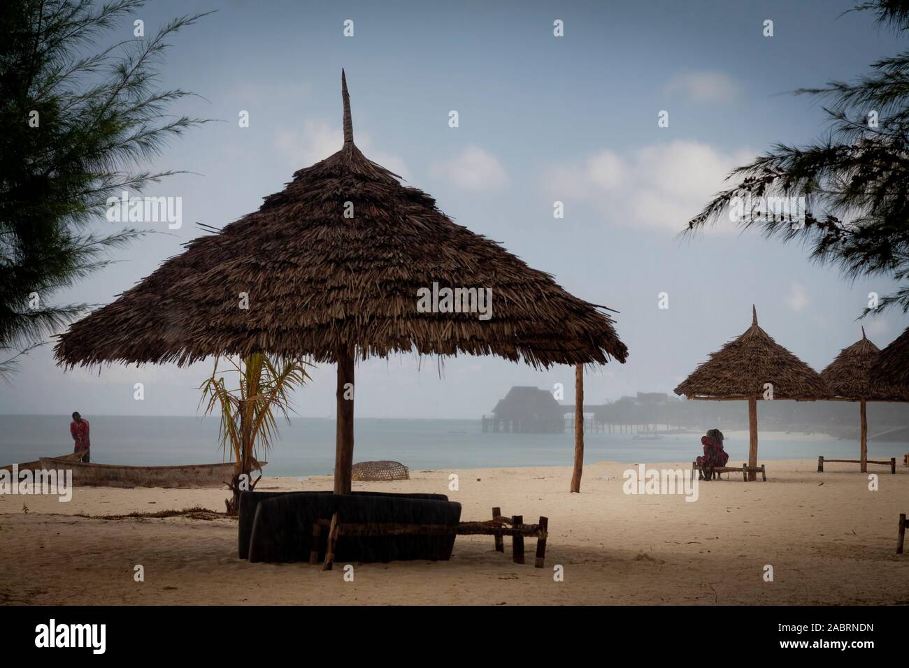 taking cover during a rain storm on Zanzibar Stock Photo - Alamy