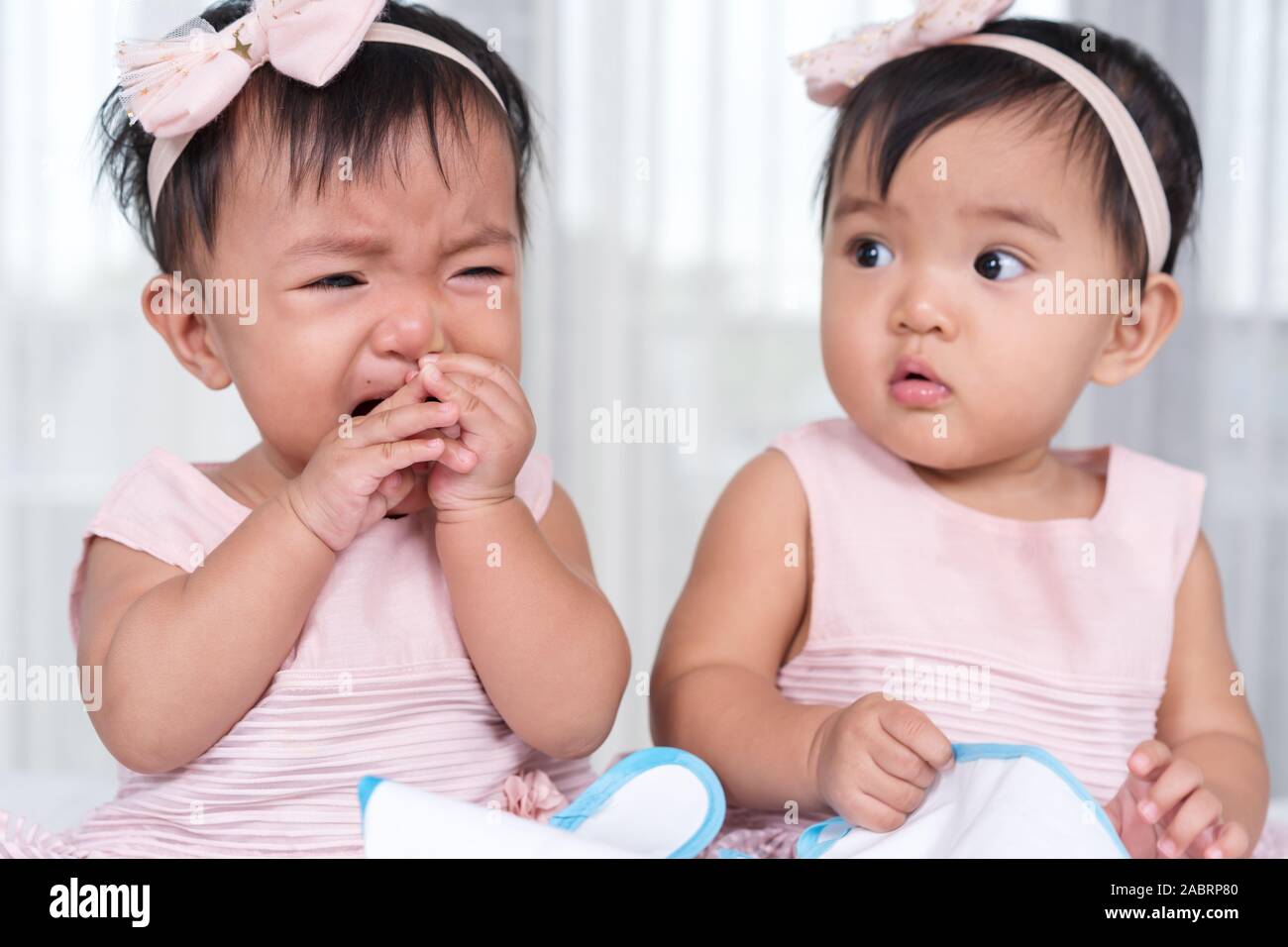 Twins, boy girl, sad hi-res stock photography and images - Alamy
