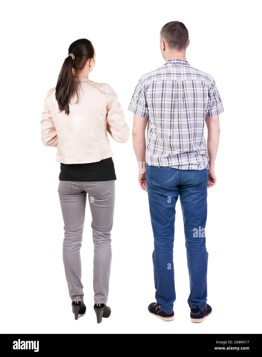 Back view of couple. beautiful friendly girl and guy together. Rear ...