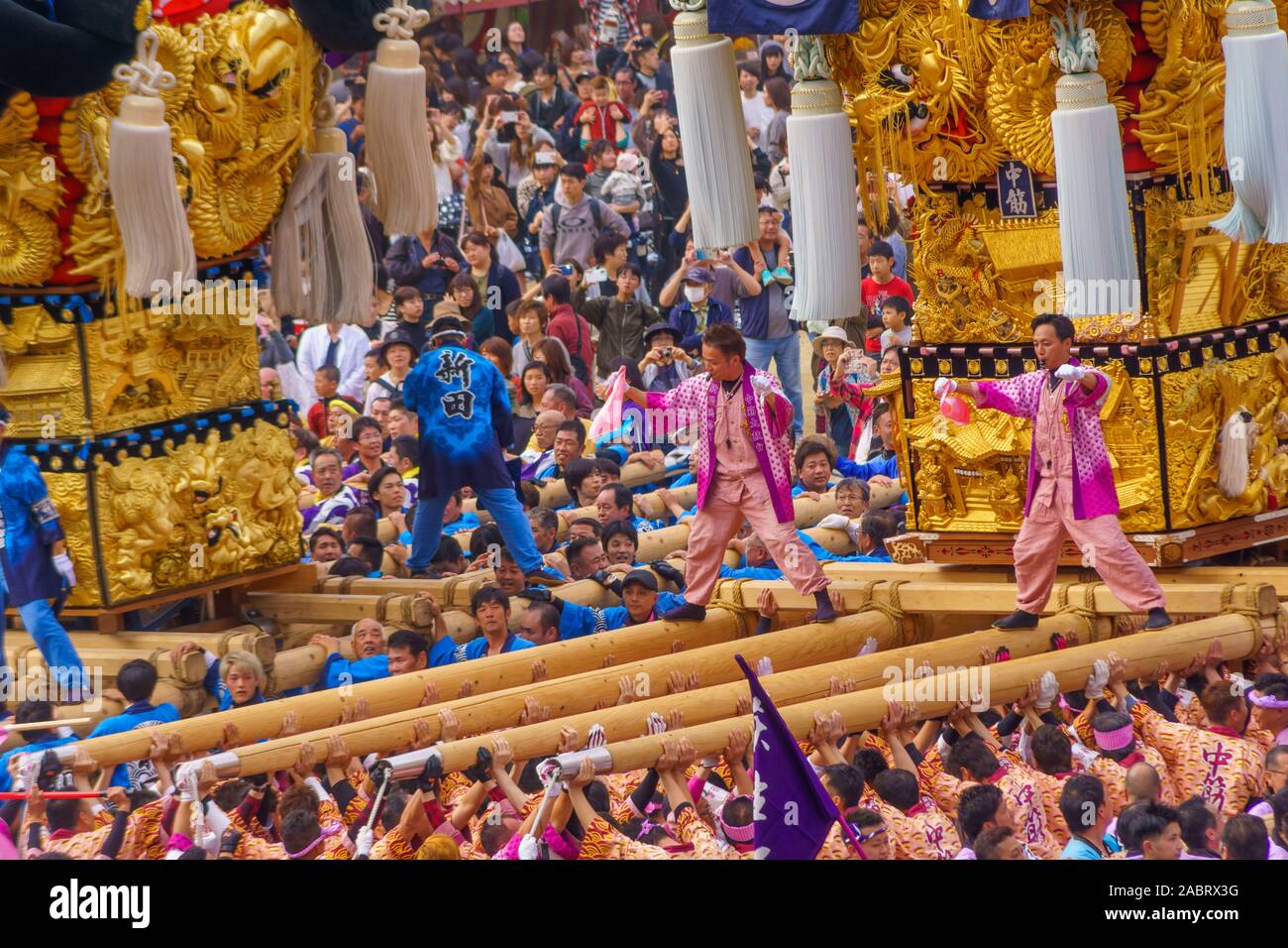 Niihama, Japan - October 17, 2019: Men in traditional clothing lifting ...