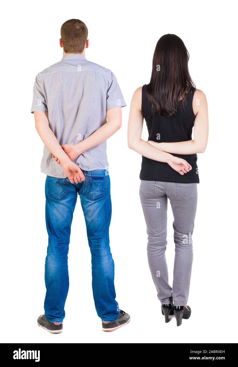 Back view of couple. beautiful friendly girl and guy together. Rear ...