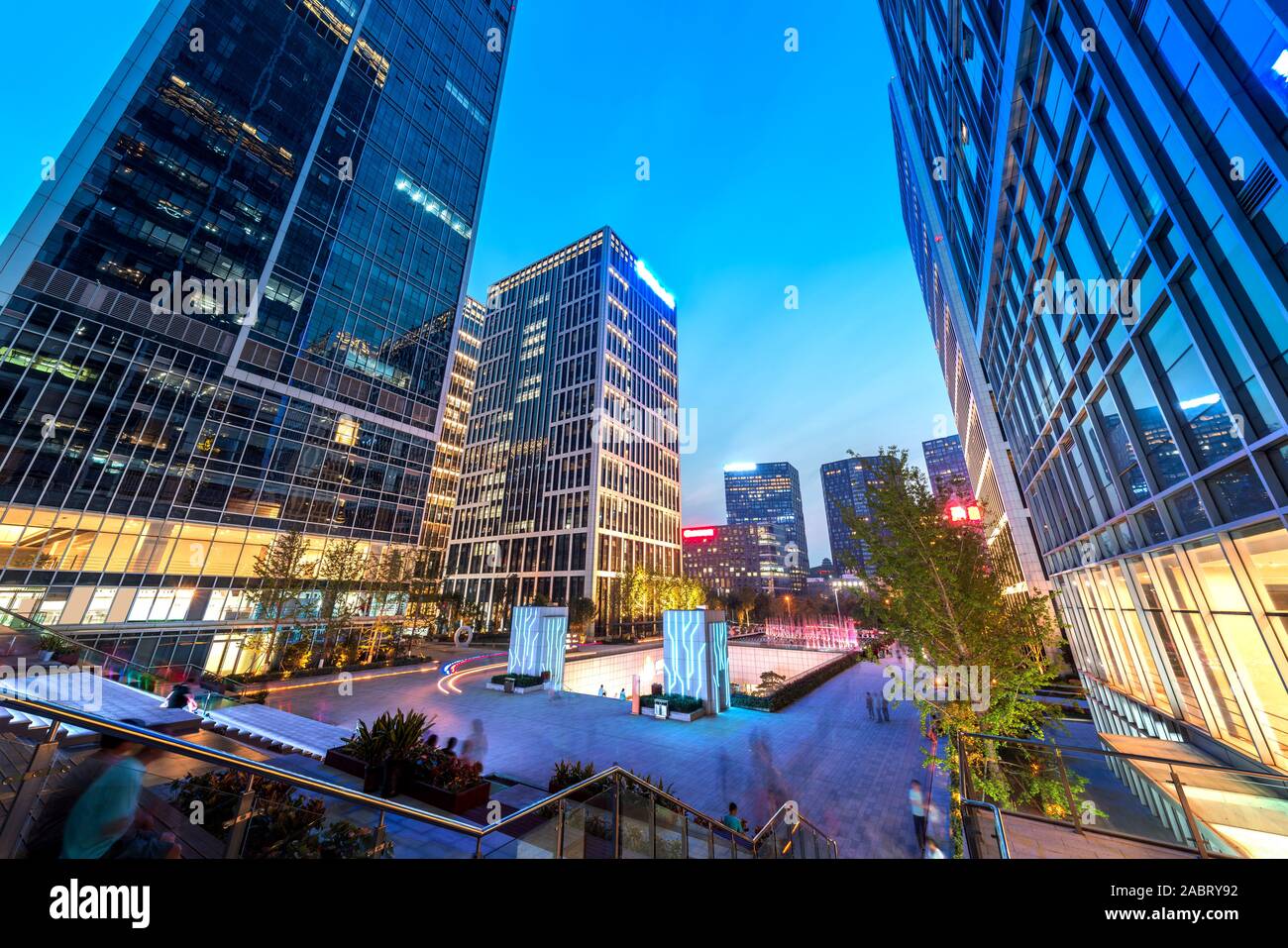 City square and modern high-rise buildings, night view of Jinan, China ...