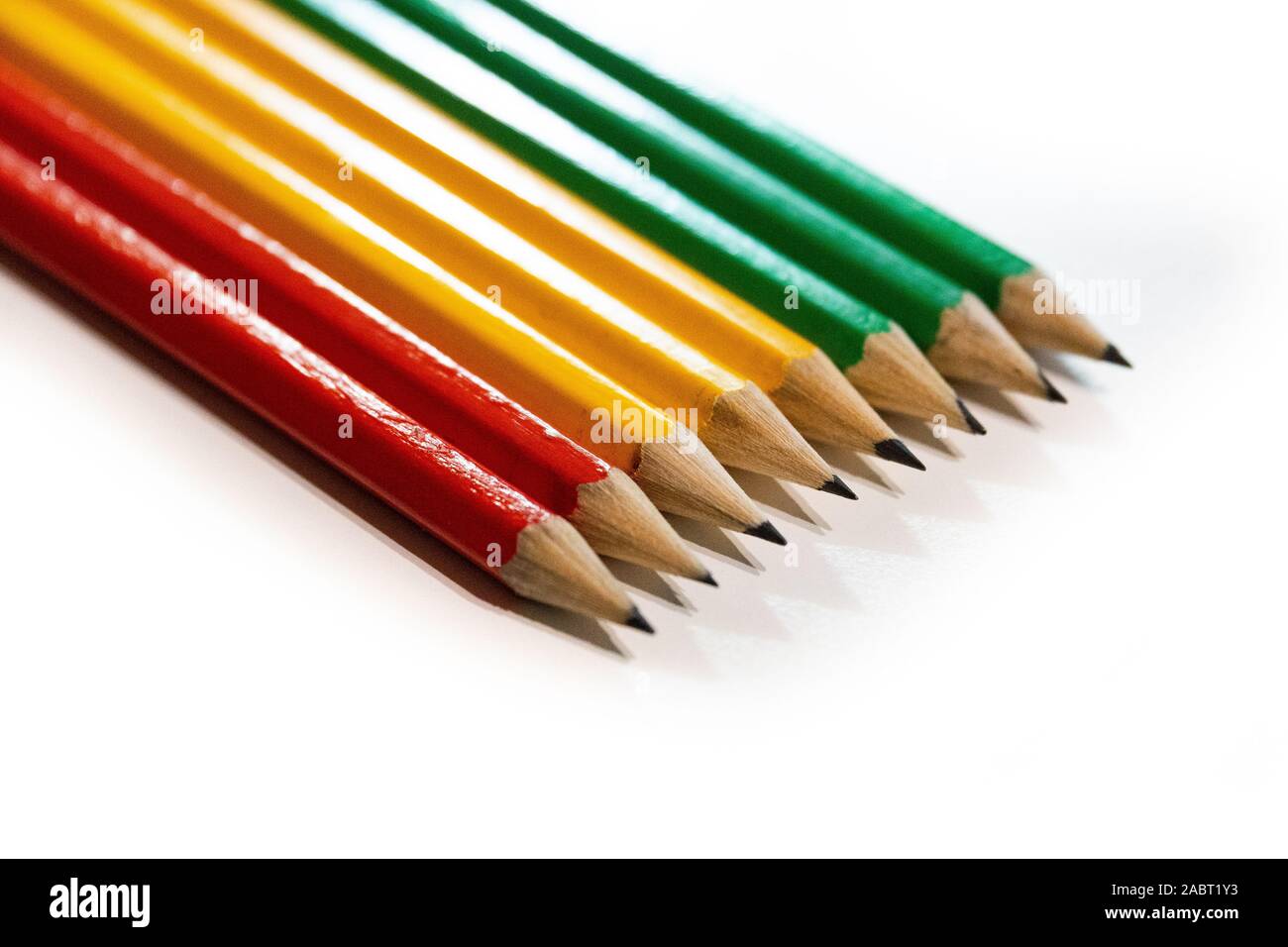 The upper side with the eraser of colorful pencils on white background ...