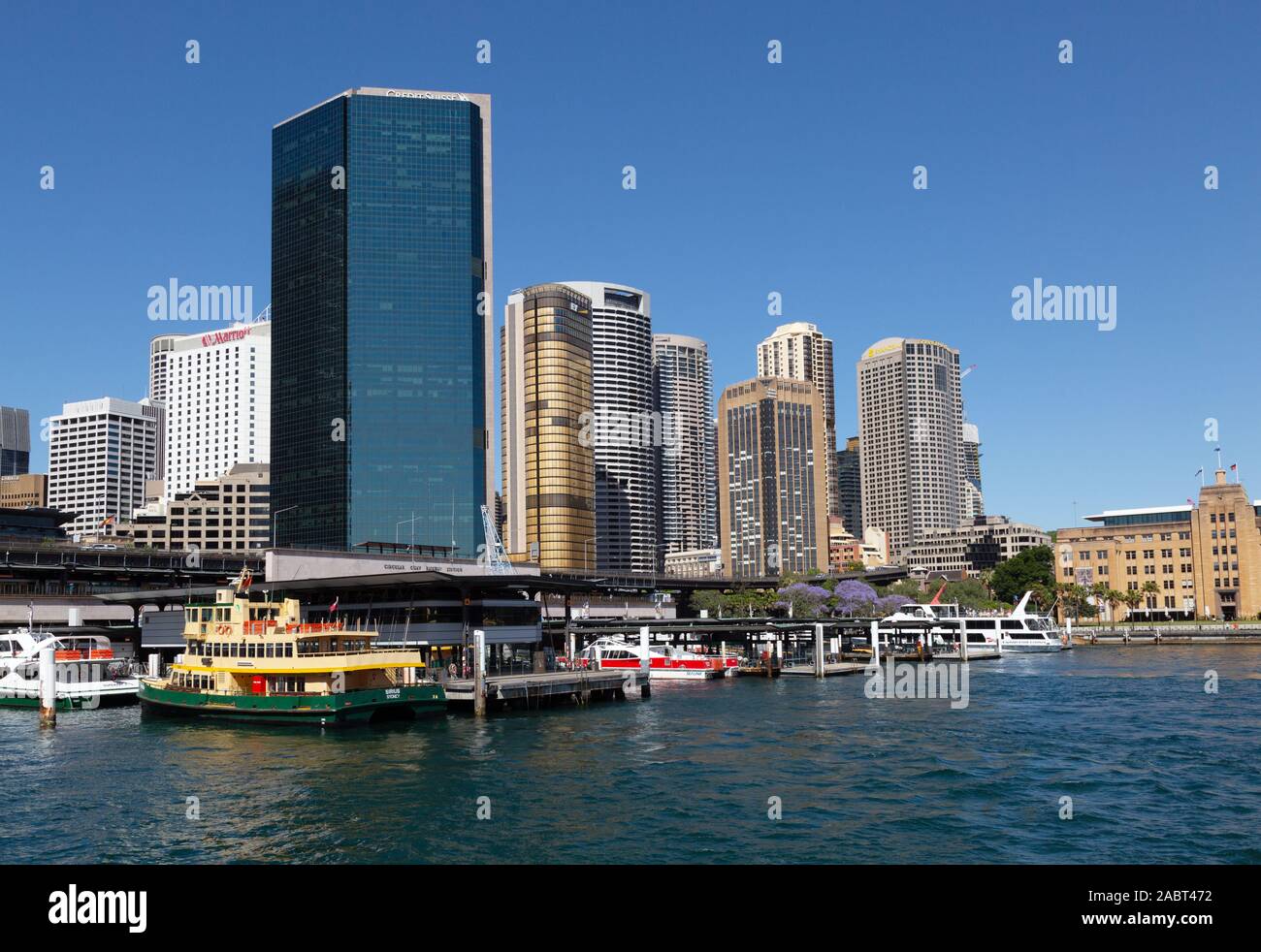 Circular Quay with moored ferries, Sydney Harbour on a sunny spring day ...