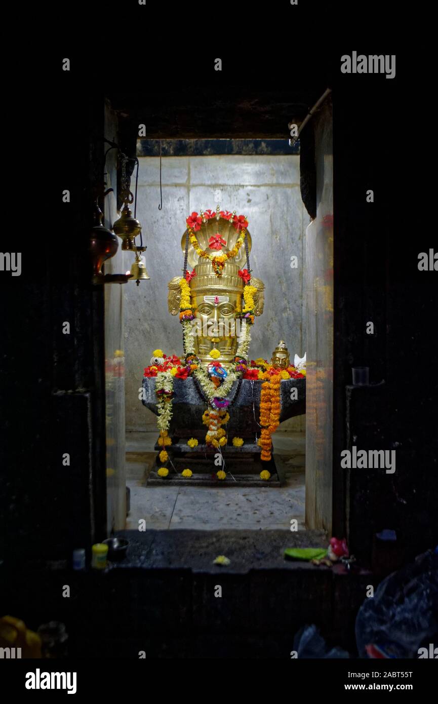 Shiva Linga with Shivas face in brass Stock Photo - Alamy