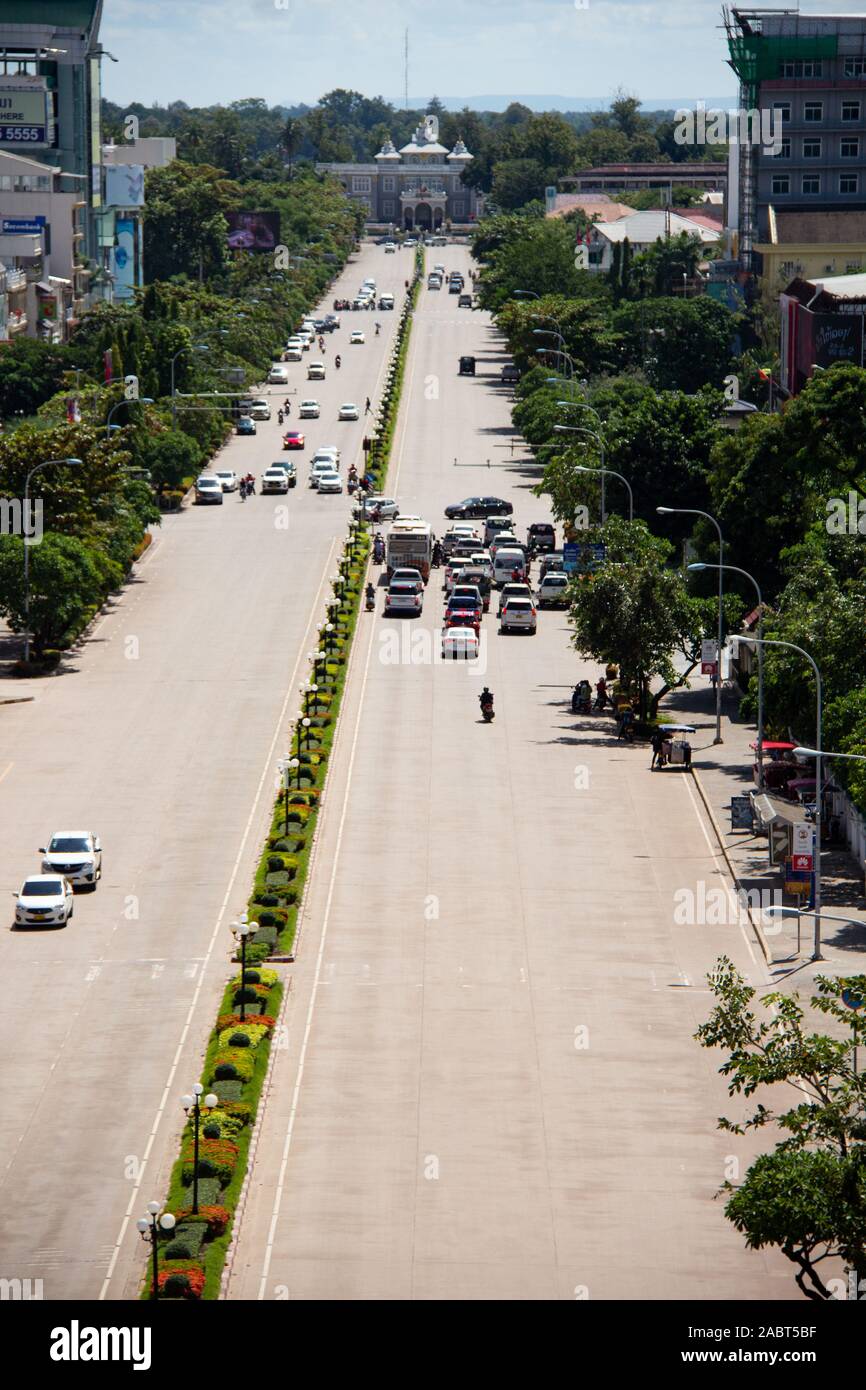 Some cars on a big road in Vientiane, perspective from the Patuxai ...