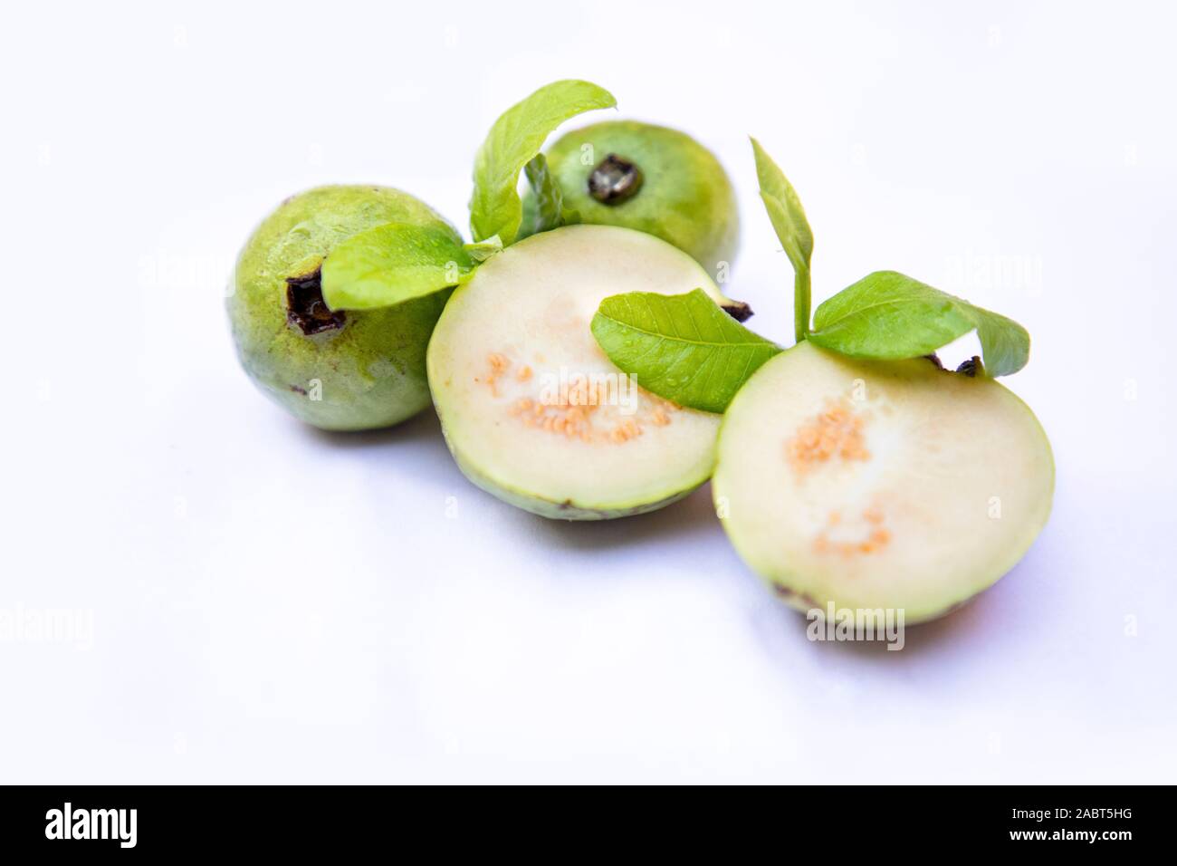 guava fruit and slice on white background. guava fruit top view white ...