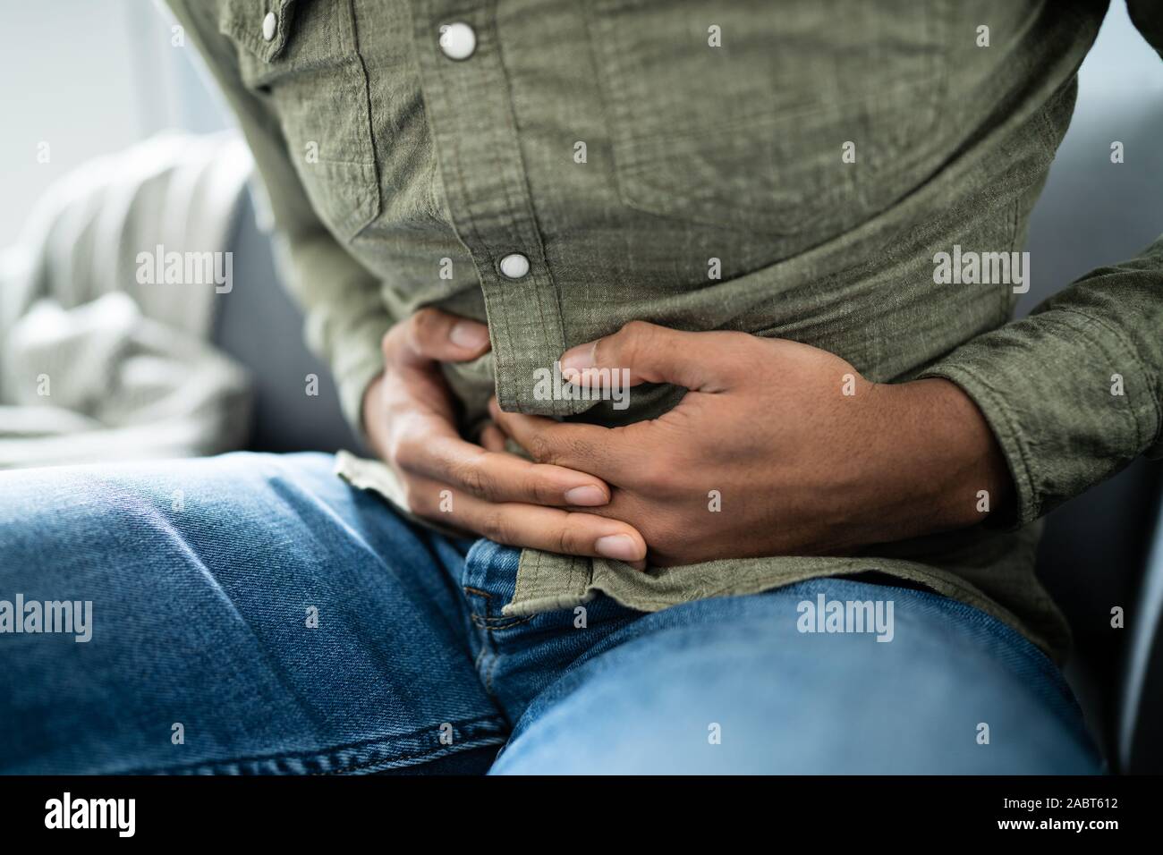 Stomach ache man hi-res stock photography and images - Alamy