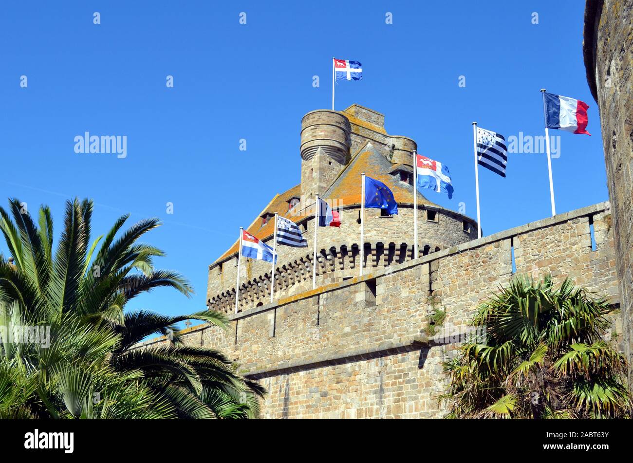 The castle is embellished with numerous flags that declare friendship ...