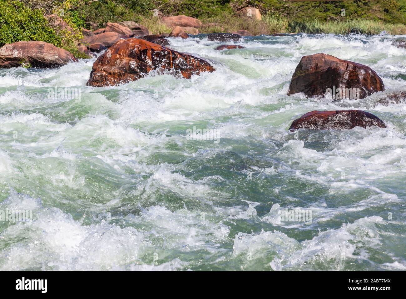 River water rapids rocks raging currents natures power closeup valley ...