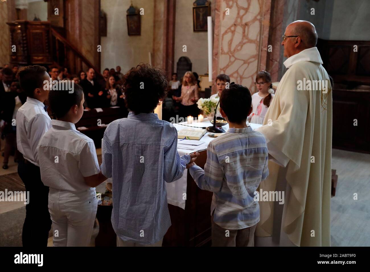 Catholic mass. First communion. Passy. France Stock Photo - Alamy