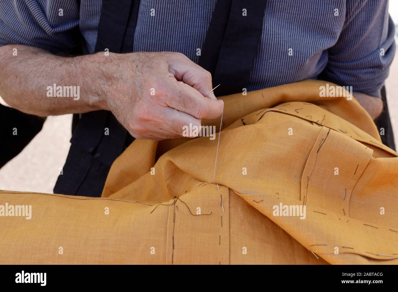 Zen sesshin (retreat) in Tamie, France. Devotee sewing a kesa Stock ...