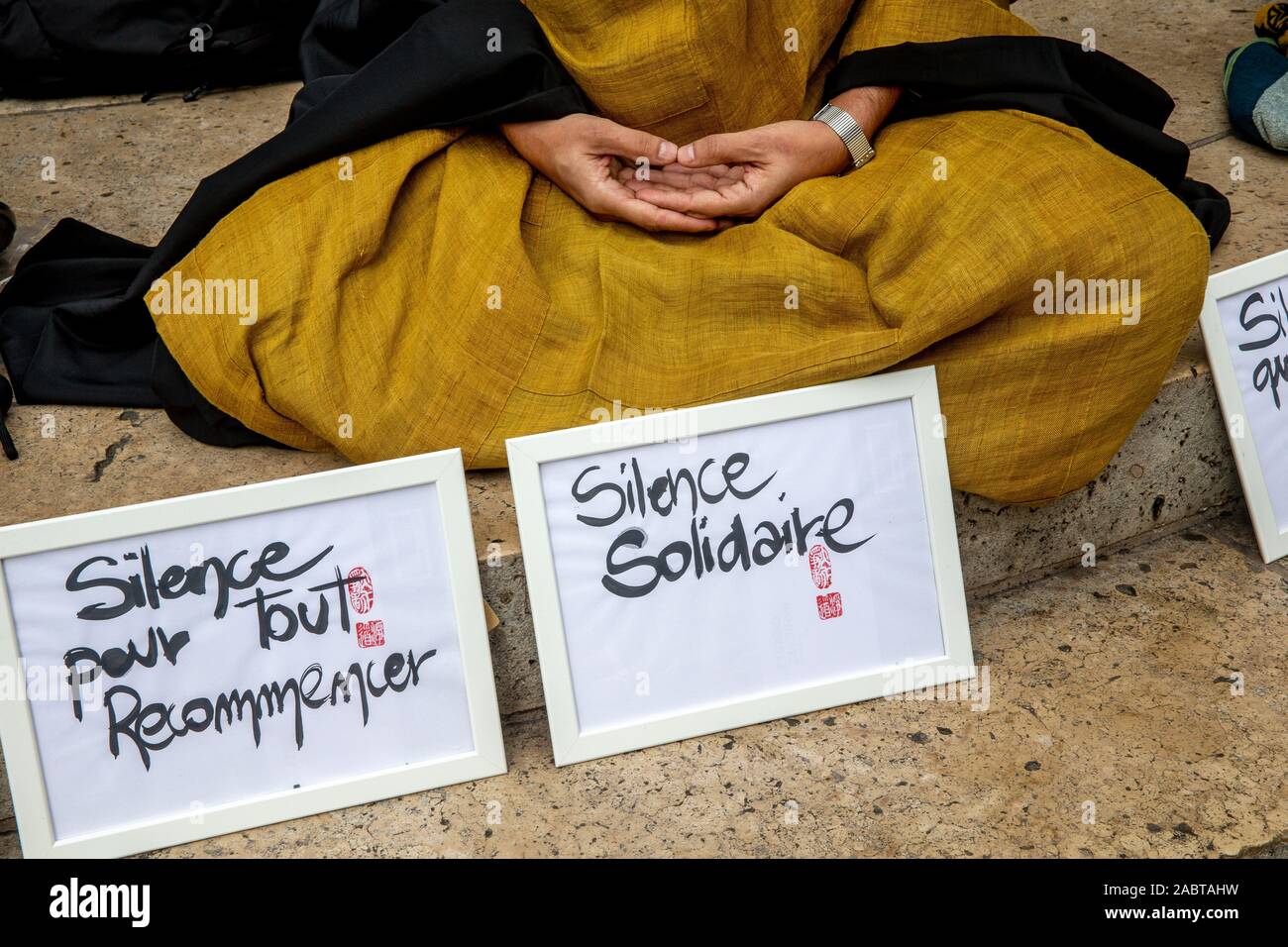Zen meditation at the start of a climate march in Paris, France Stock ...