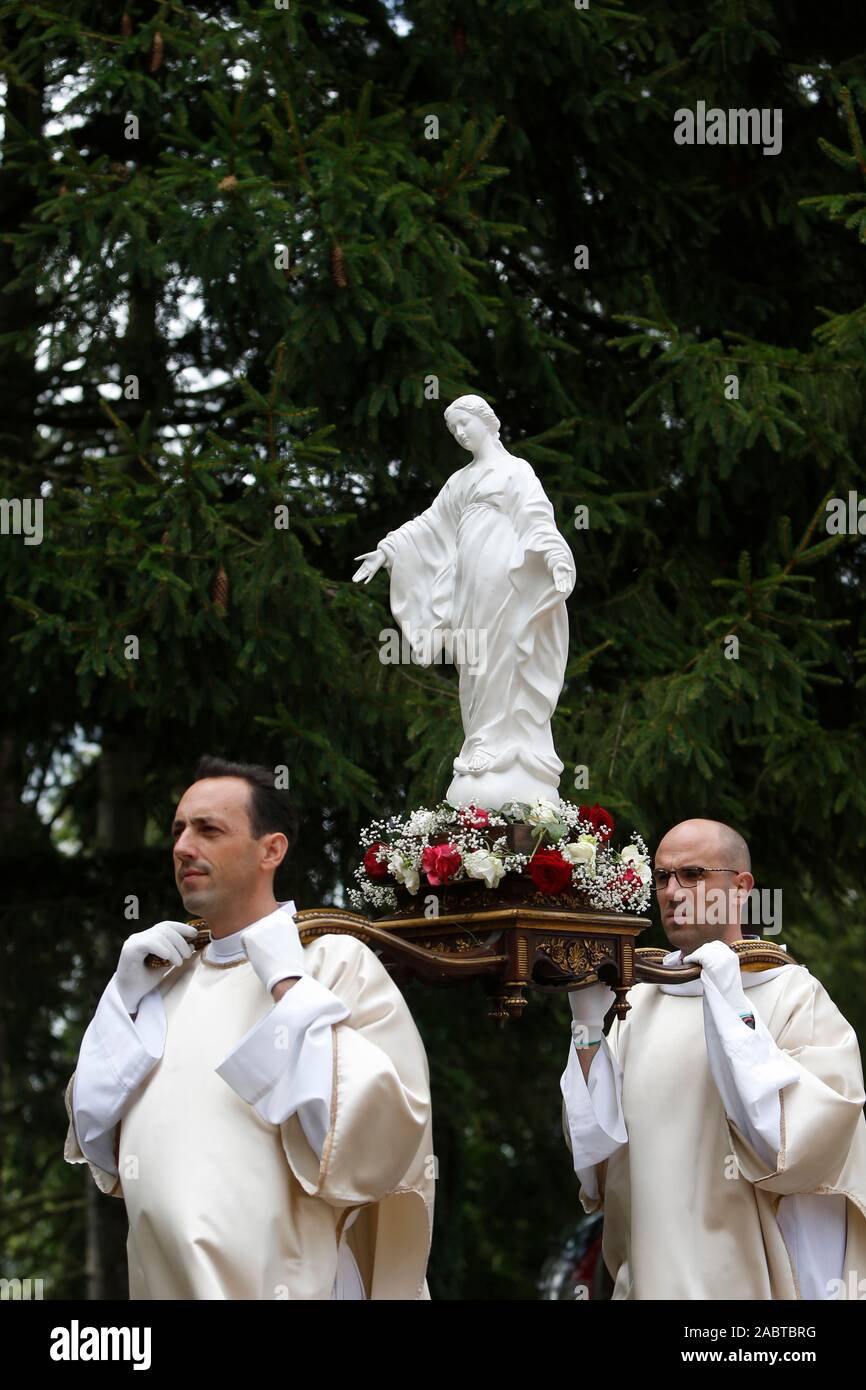 Assumption celebration at St Teresa basilica, Lisieux, France. Marian ...