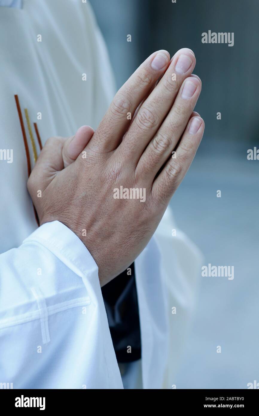 Catholic priests hands hi-res stock photography and images - Alamy