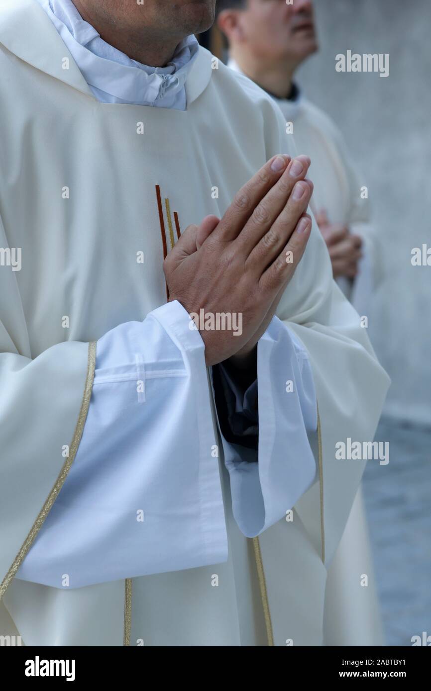 Catholic priests hands hi-res stock photography and images - Alamy