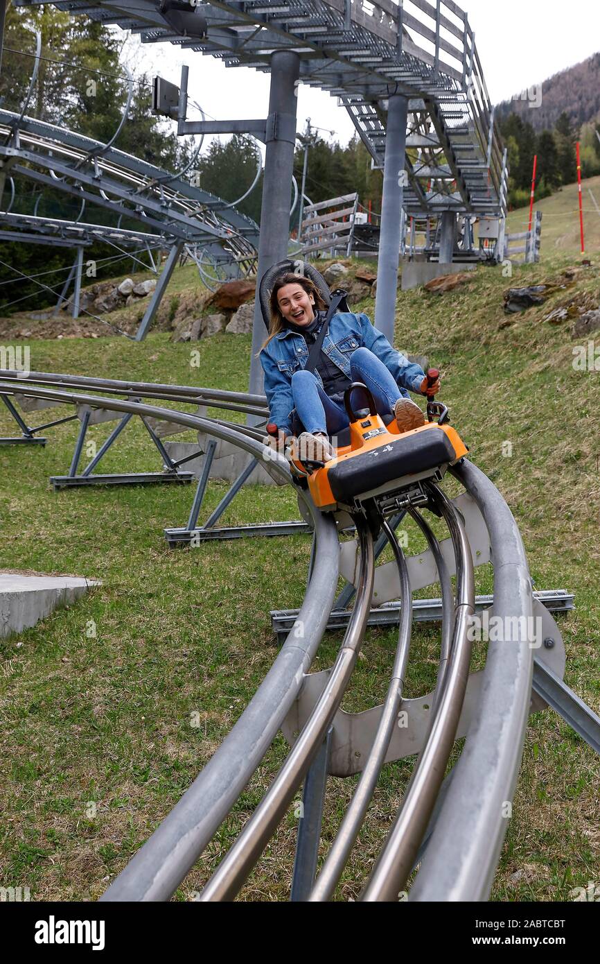 Young woman riding an alpine coaster in Chamonix, France Stock Photo ...