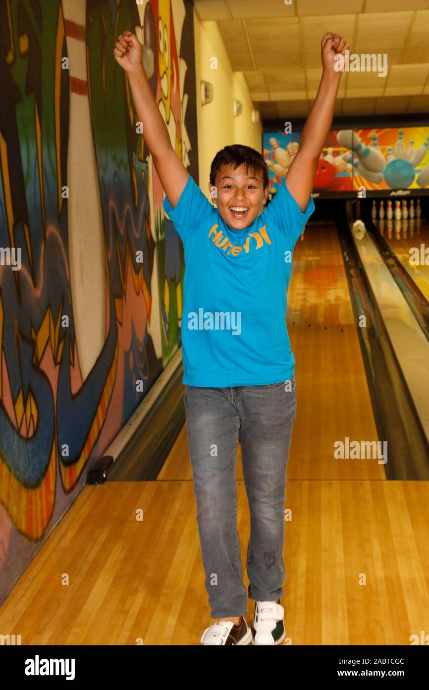Bowling boy hi-res stock photography and images - Alamy