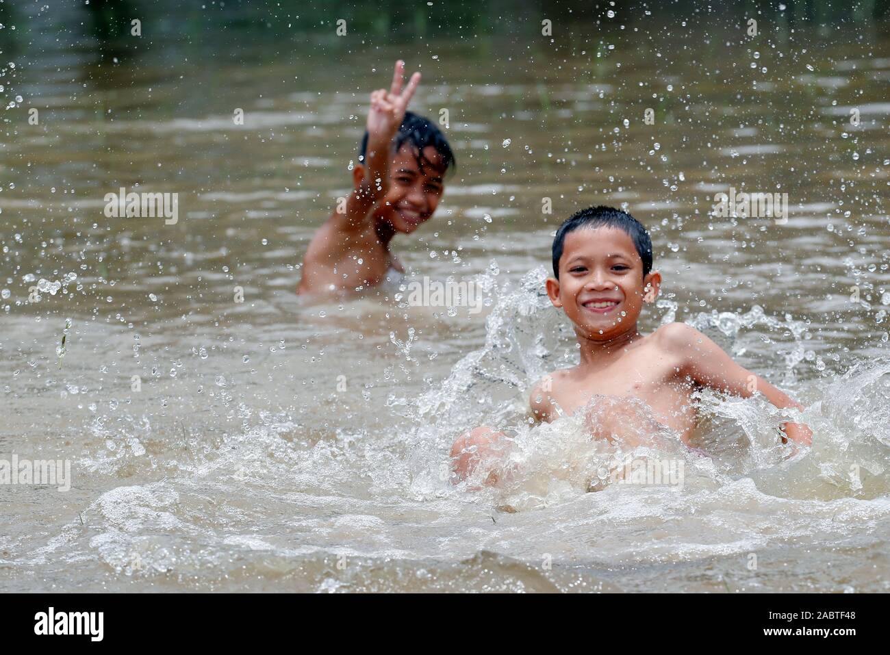 Boys in rural cambodia playing hi-res stock photography and images - Alamy