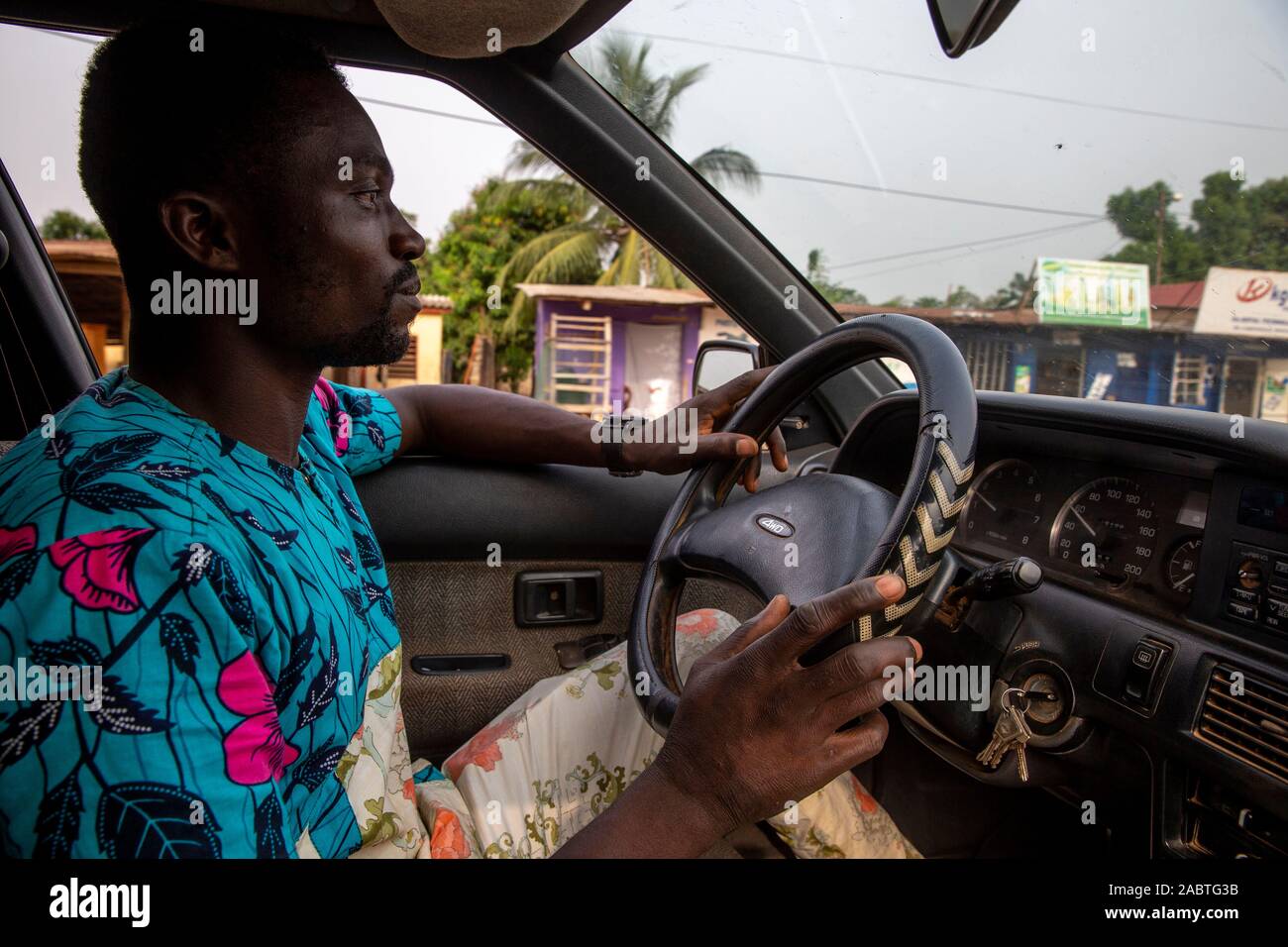 Taxi driver in Kpalime, Togo Stock Photo - Alamy