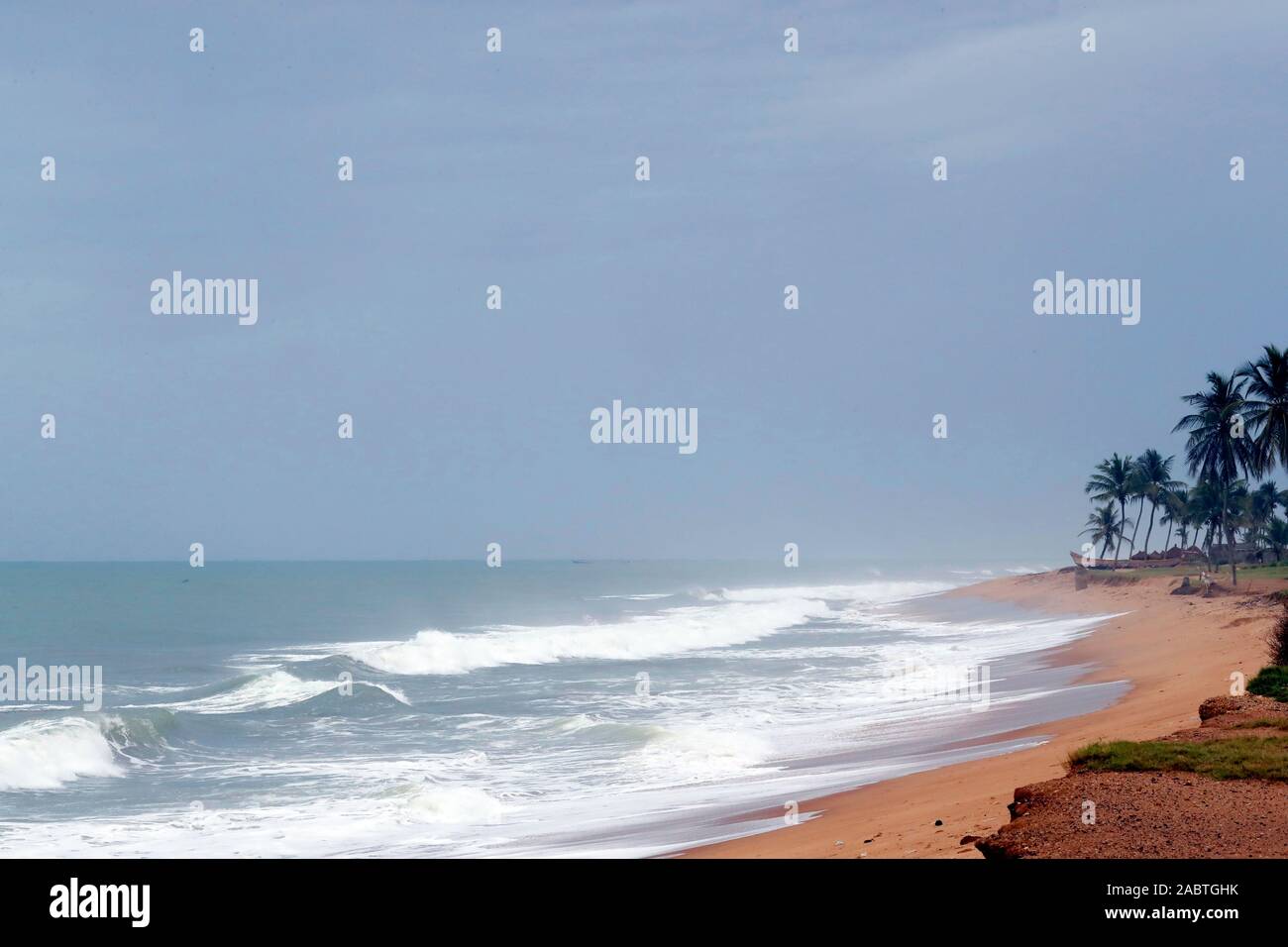 The ocean and a beach with palm trees. Aneho. Togo Stock Photo - Alamy