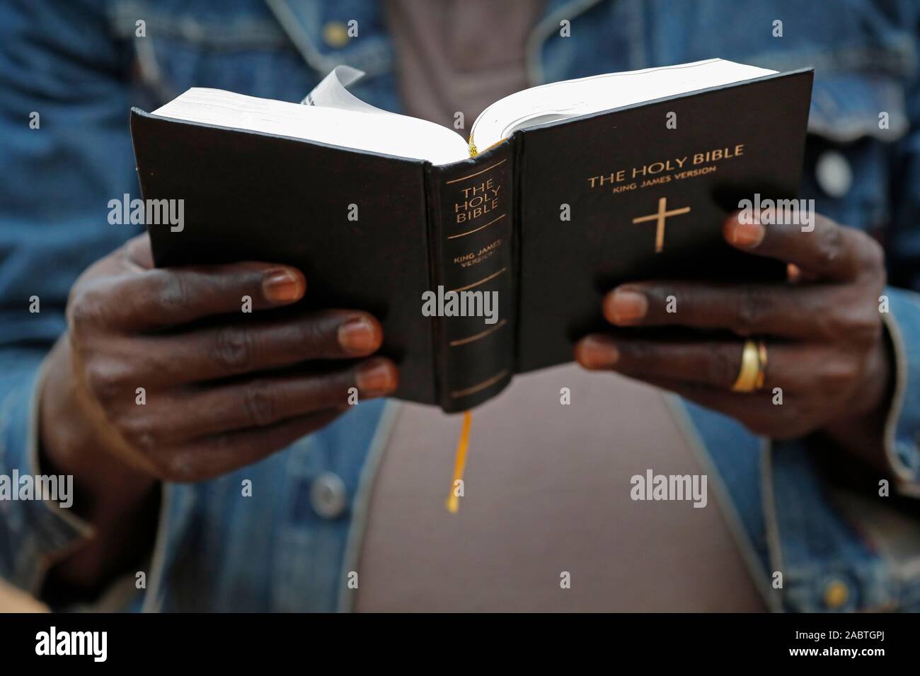 Bible study. African man reading the holy bible. Lome. Togo Stock Photo ...
