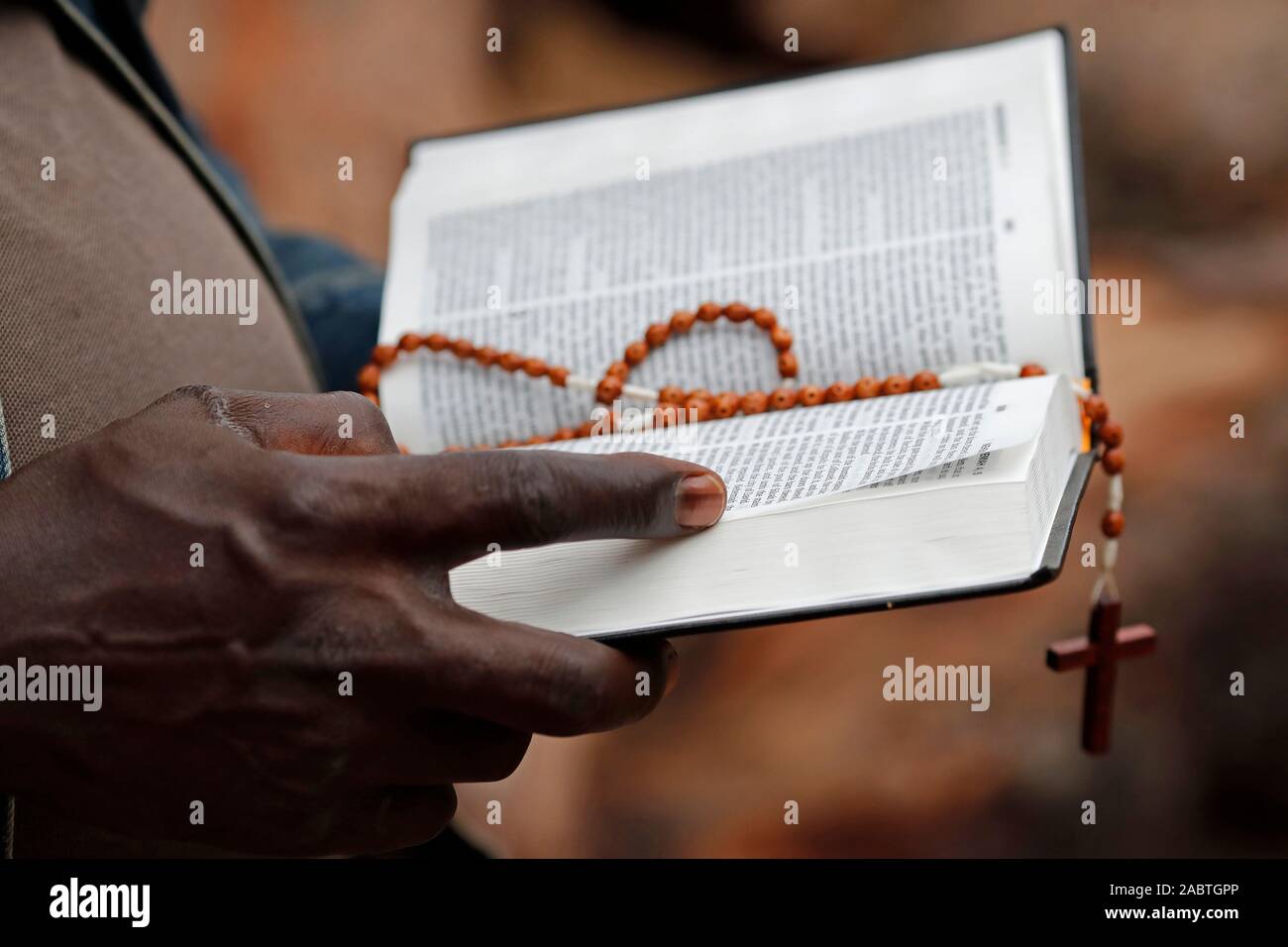 Bible study. African man reading the holy bible. Lome. Togo Stock Photo ...