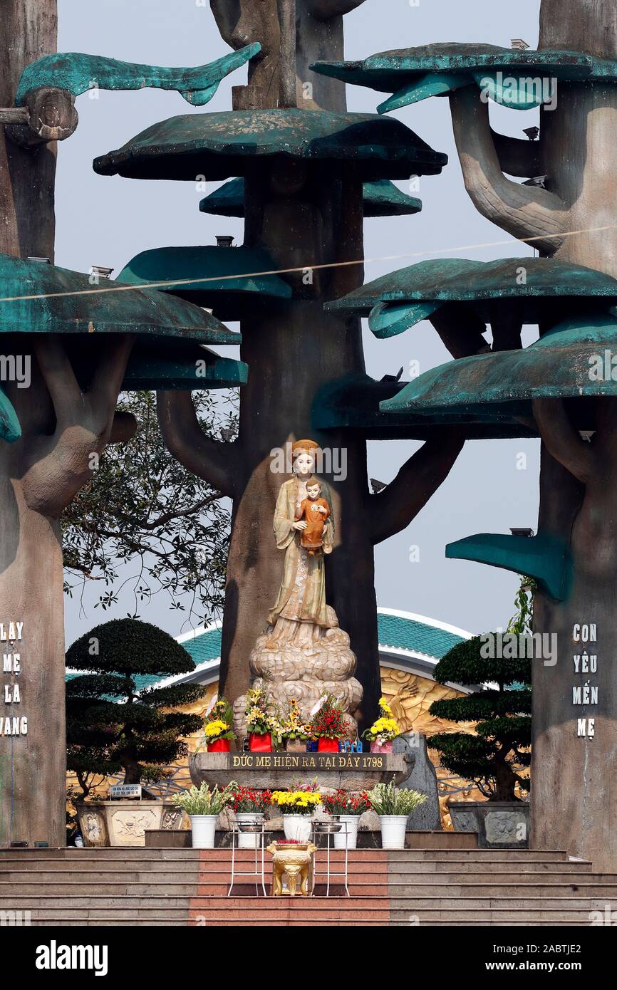 Statue of Our Lady of La Vang in Ao Dai dress. Basilica of Our Lady of ...