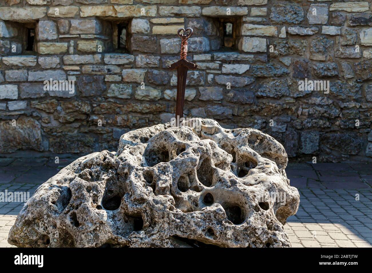 Sword rock forest legend hi-res stock photography and images - Alamy