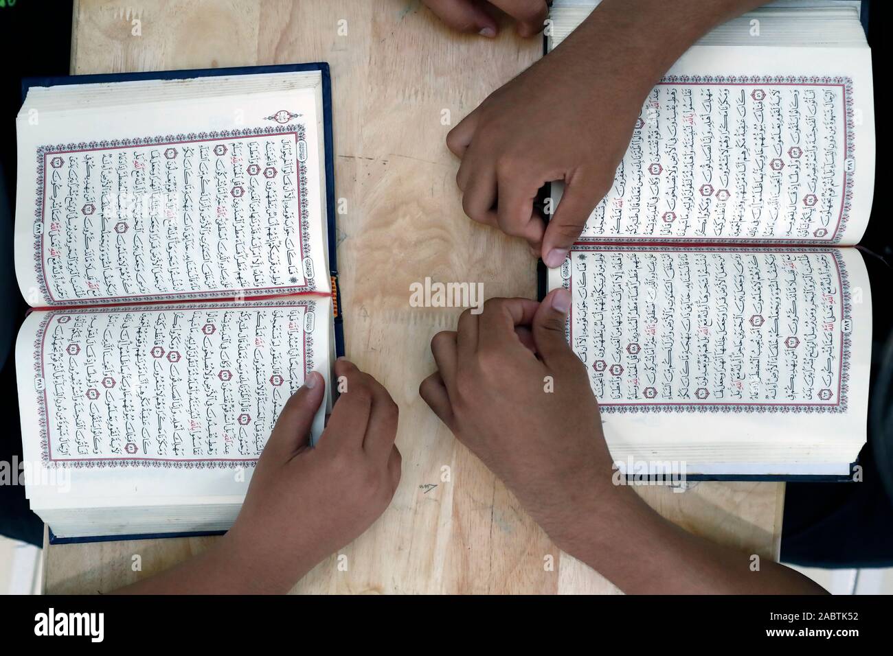 Learning quran hi-res stock photography and images - Alamy
