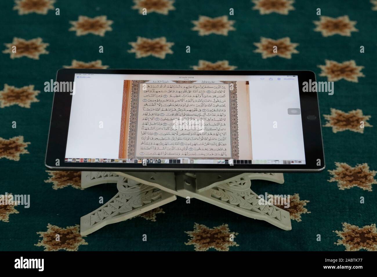 Electronic Quran on a tablet Stock Photo - Alamy