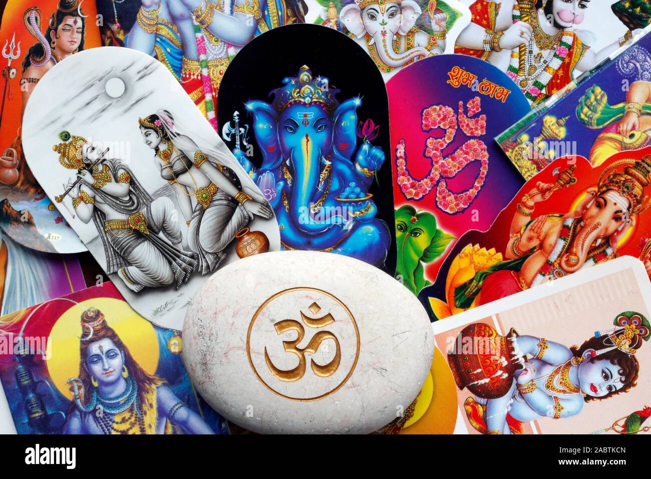 The Om or Aum symbol. Hindu god images. Krishna and Radha. Ganesh ...