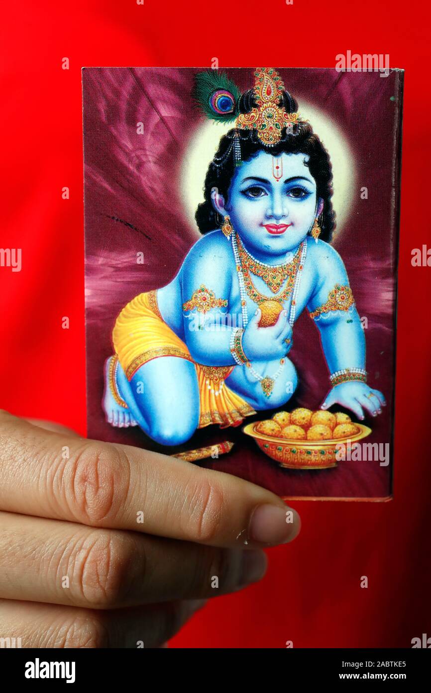 Krishna. Close-up. Hindu god image in hand Stock Photo - Alamy