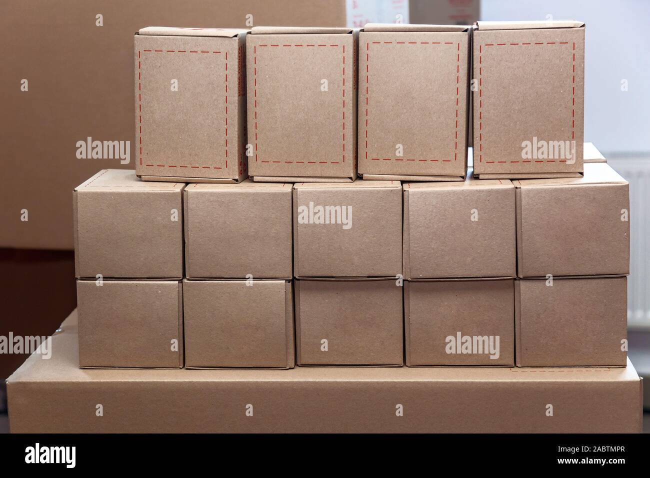 Rectangular boxes are placed in three equal rows on a stand Stock Photo ...
