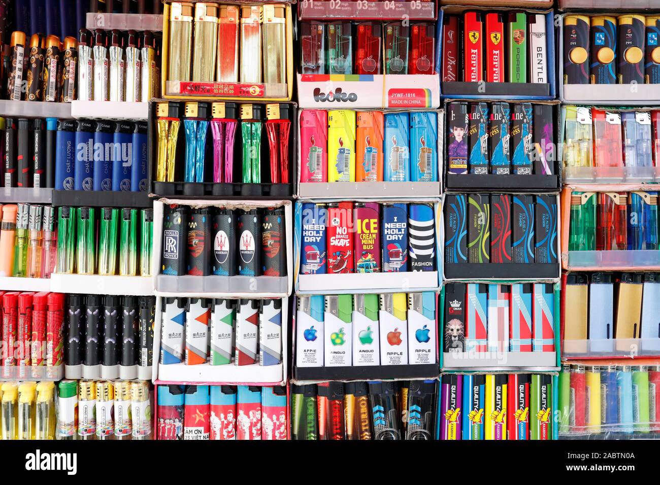 Lighters for sale at market. Ho Chi Minh City. Vietnam Stock Photo - Alamy