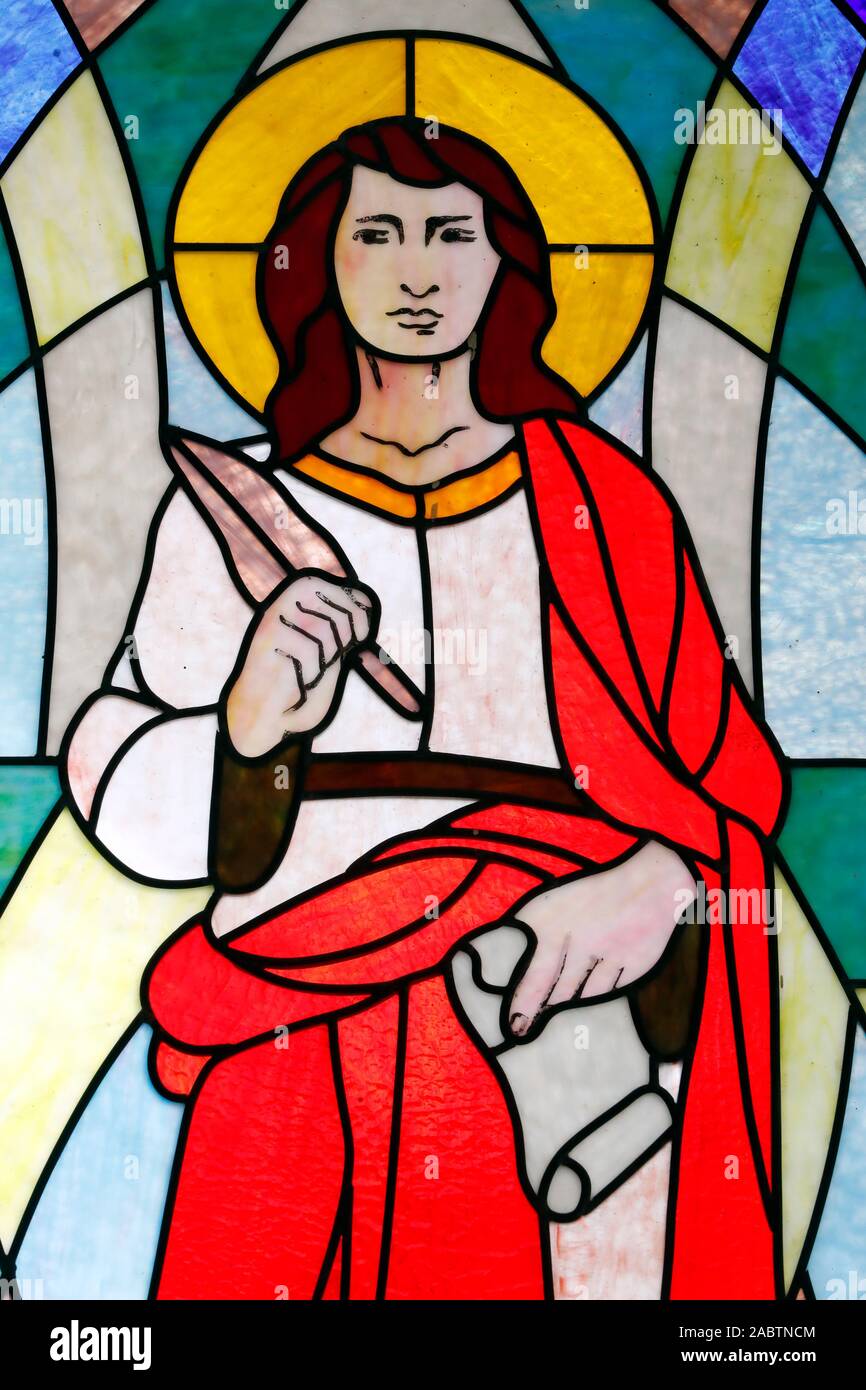 Holy Rosary church. Stained glass window. Saint John the Evangelist ...
