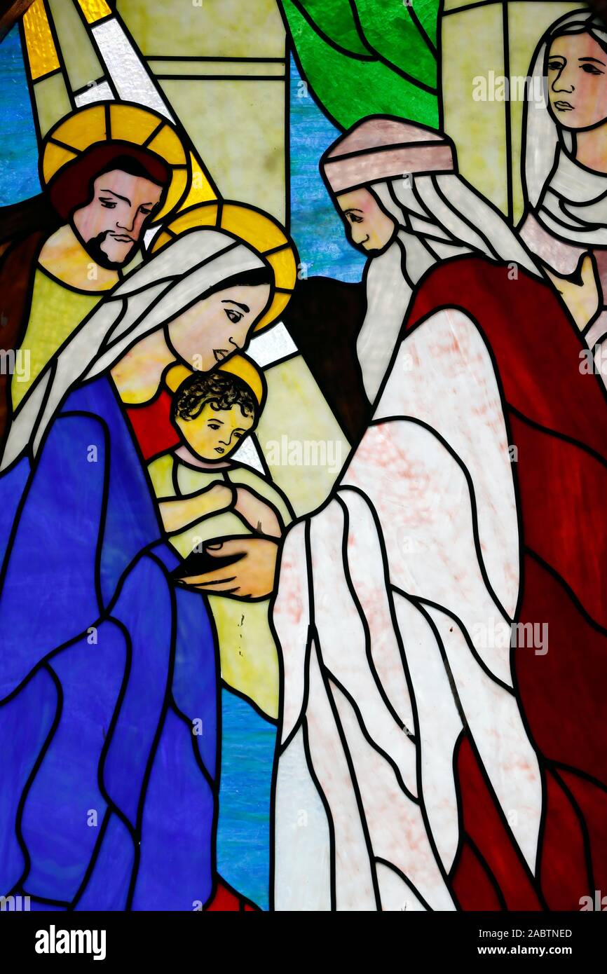 Holy Rosary church. Stained glass window. Presentation of Jesus at the ...