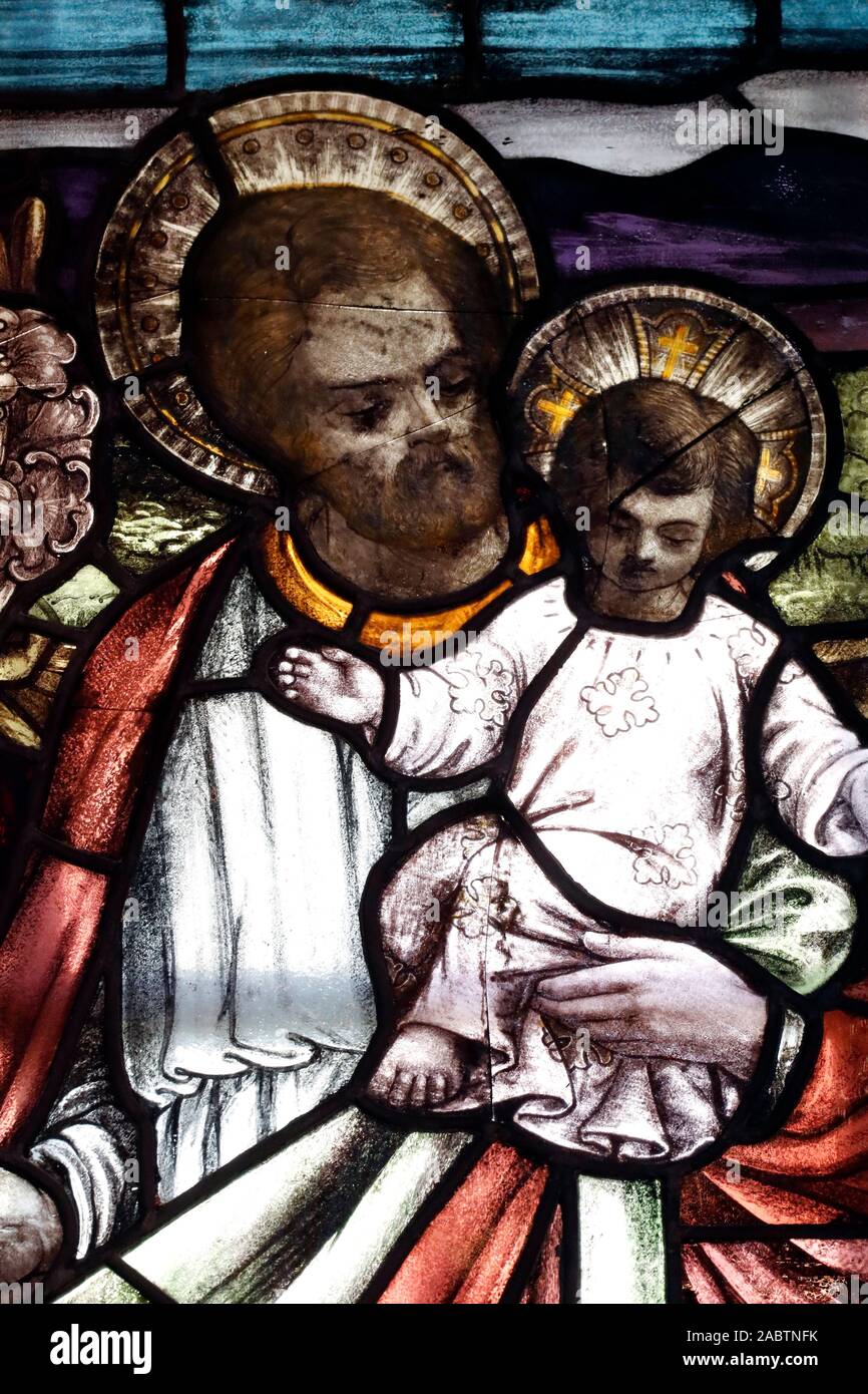 Cua Bac catholic church. Stained glass window. Saint Joseph with infant ...