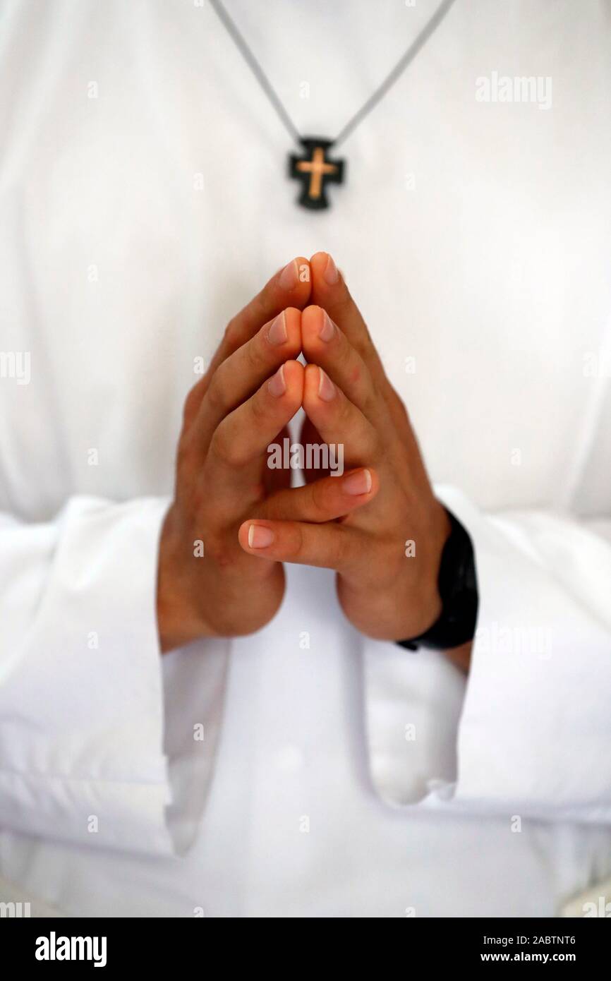 Hands joined in prayer hi-res stock photography and images - Alamy