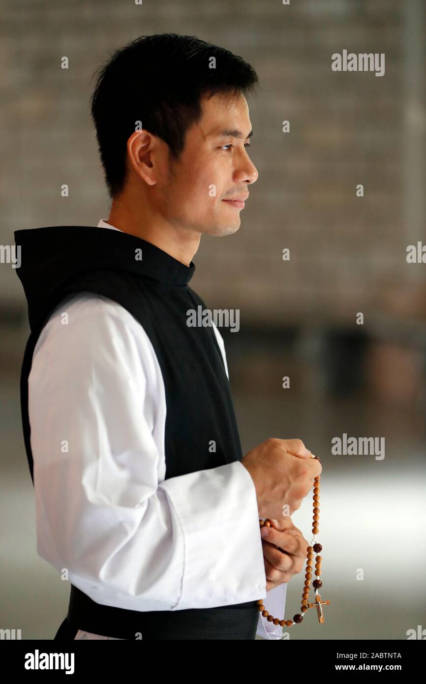 Cistercian Abbey. Our Lady of My Ca. Monk praying the Rosary. Vietnam ...